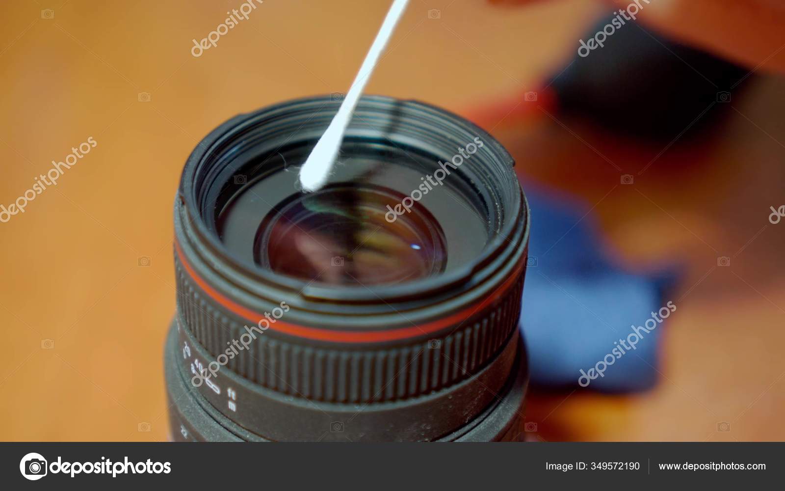 Clean Camera Lens Man Hand Brushing Lens — Stock Photo © vlamin #349572190