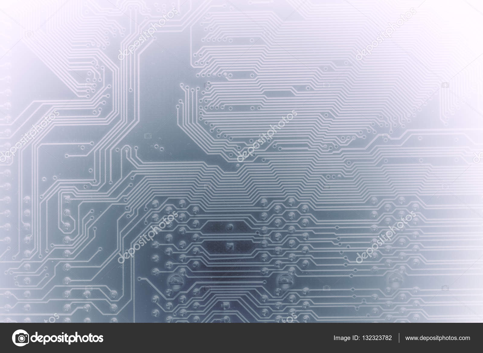 Circuit board toned into light blue. Electronic computer hardware ...