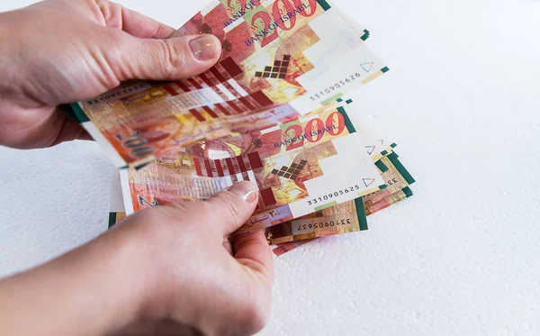 Two hundred shekel bank notes . — Stock Photo © suprunvit #82199744