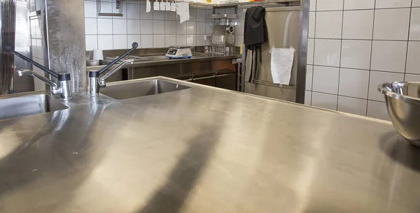 Professional kitchen, view counter in steel - Stock Image - Everypixel