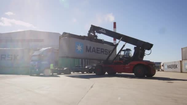 Container Handler is Loading Container onto Truck in Logistic Center ...