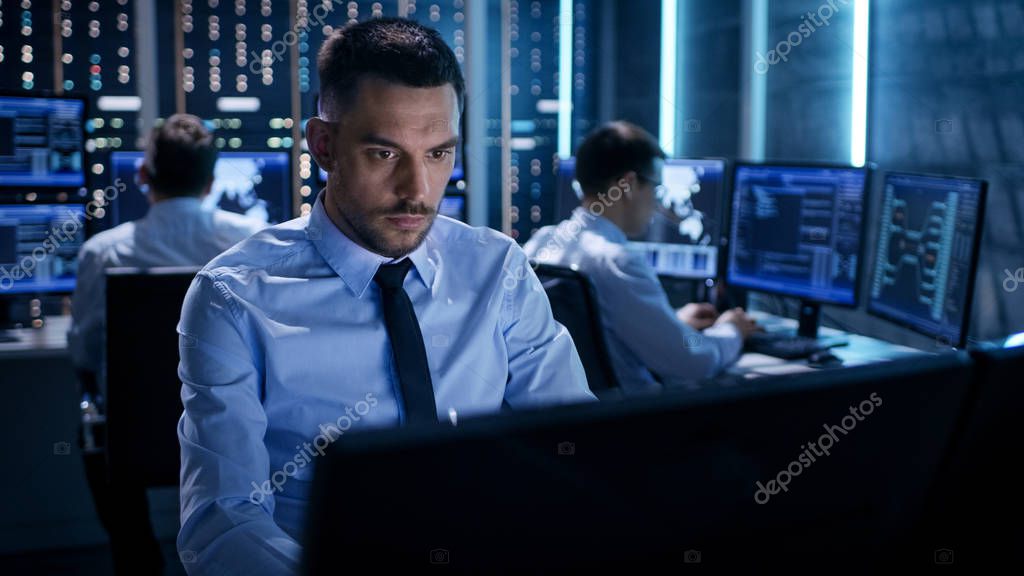 Close-up of Technical Engineer Working on His Computer With Mult ...