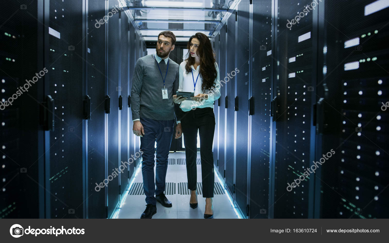 IT Specialist Showing Working Data Center with Rows of Rack Serv Stock ...