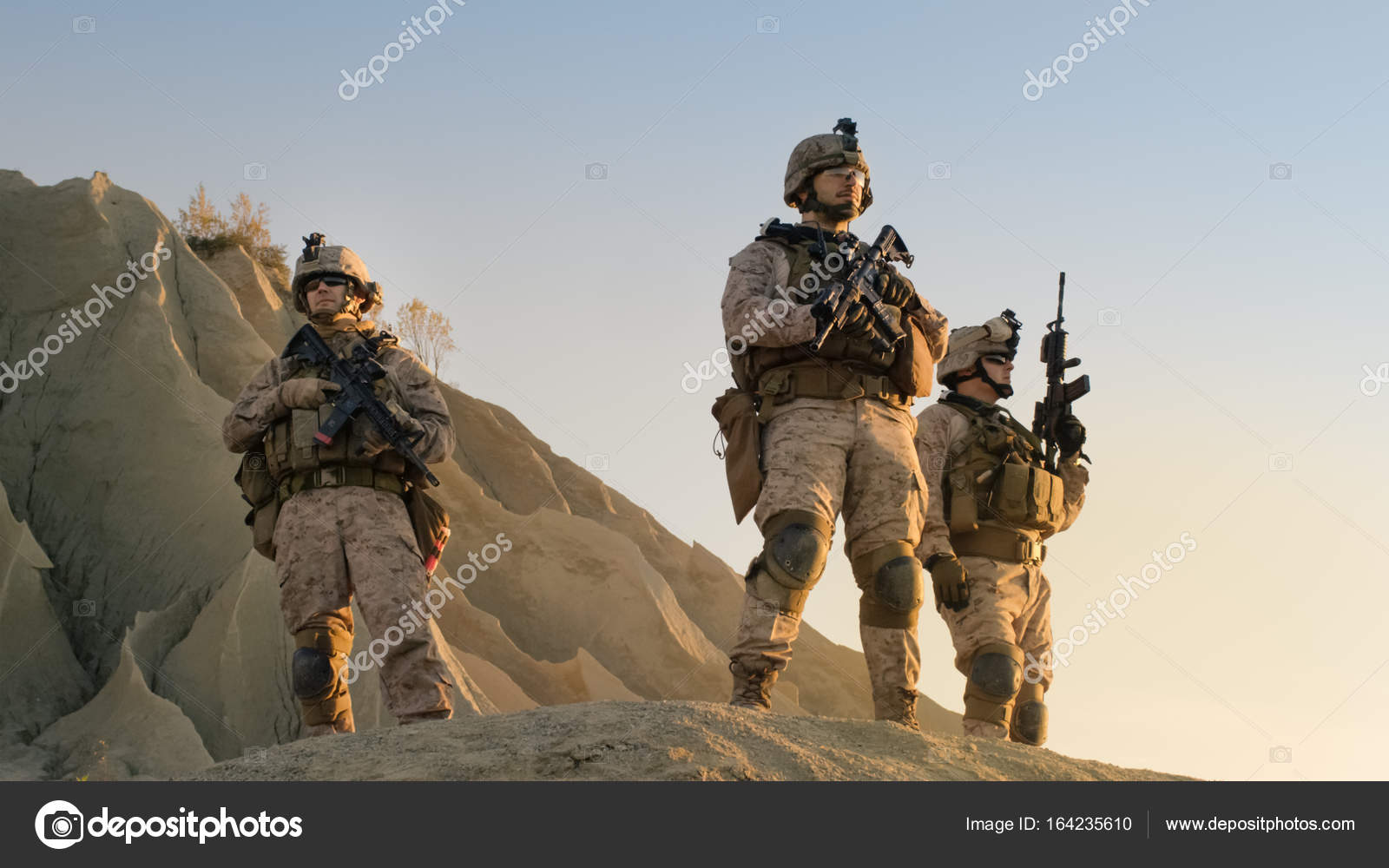 Squad of Three Fully Equipped and Armed Soldiers Standing on Hil Stock ...