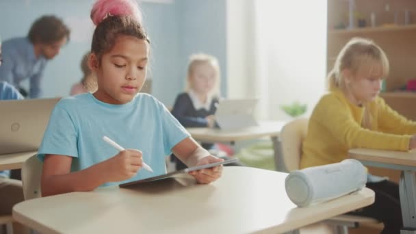 Elementary School Computer Science Class: Smart Boy Uses Digital Tablet ...