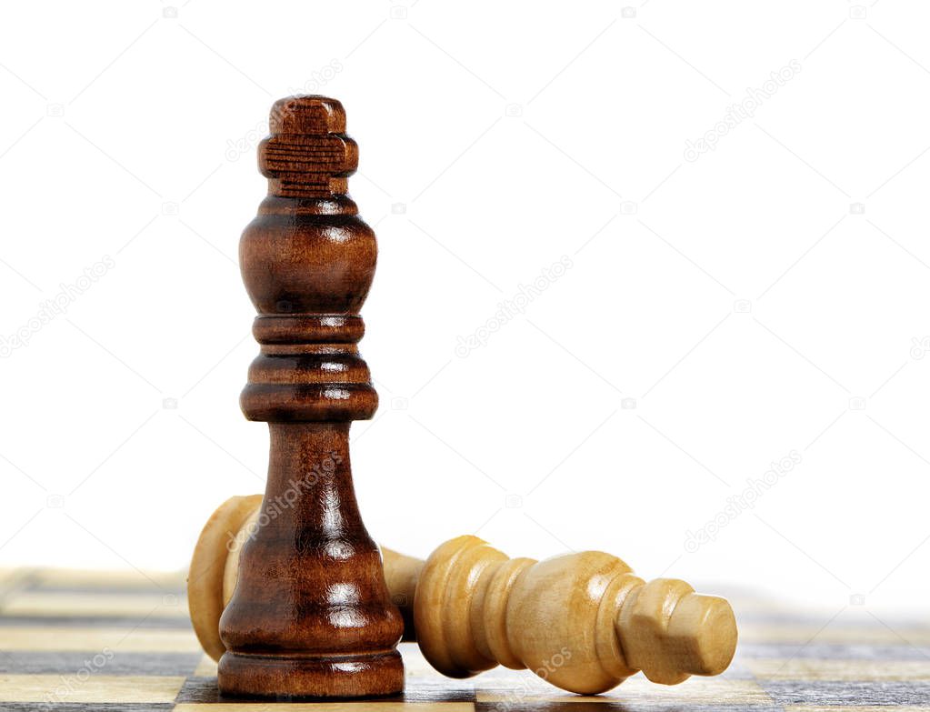 Checkmate wooden pieces on board — Stock Photo © Greatstock #128858838