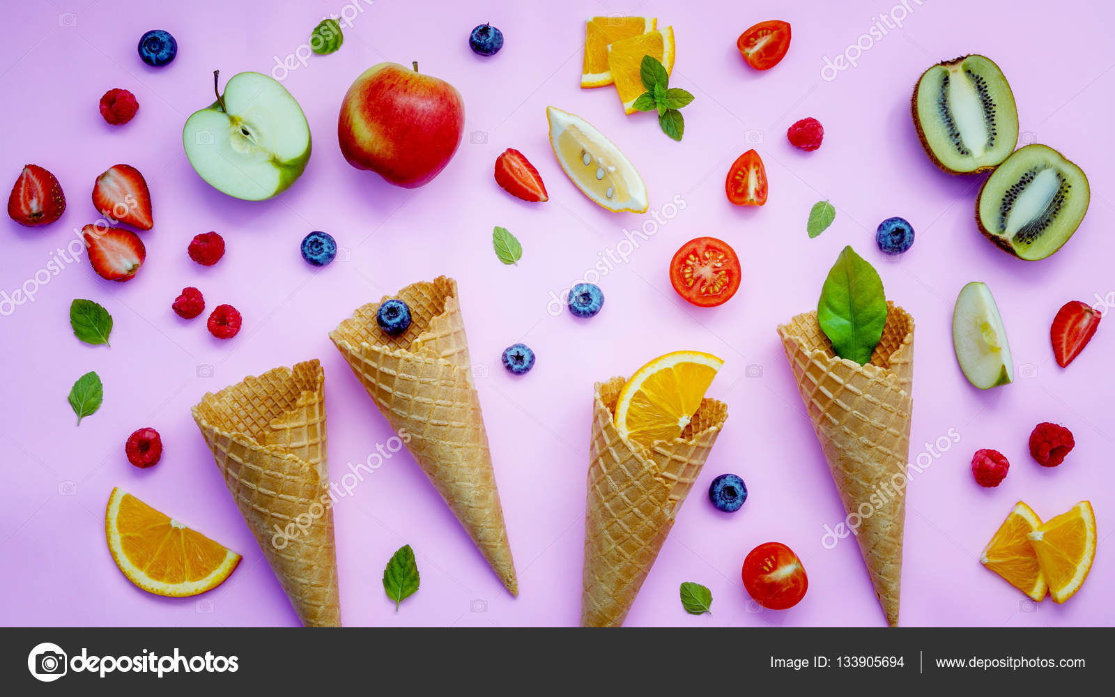Cones and colorful various fruits raspberry ,blueberry ,strawber Stock ...