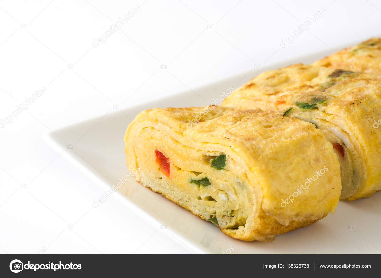 Traditional tamagoyaki Japanese omelette isolated on white background ...