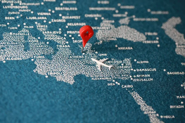 painted travel map with the pin and plane - Stock Image - Everypixel