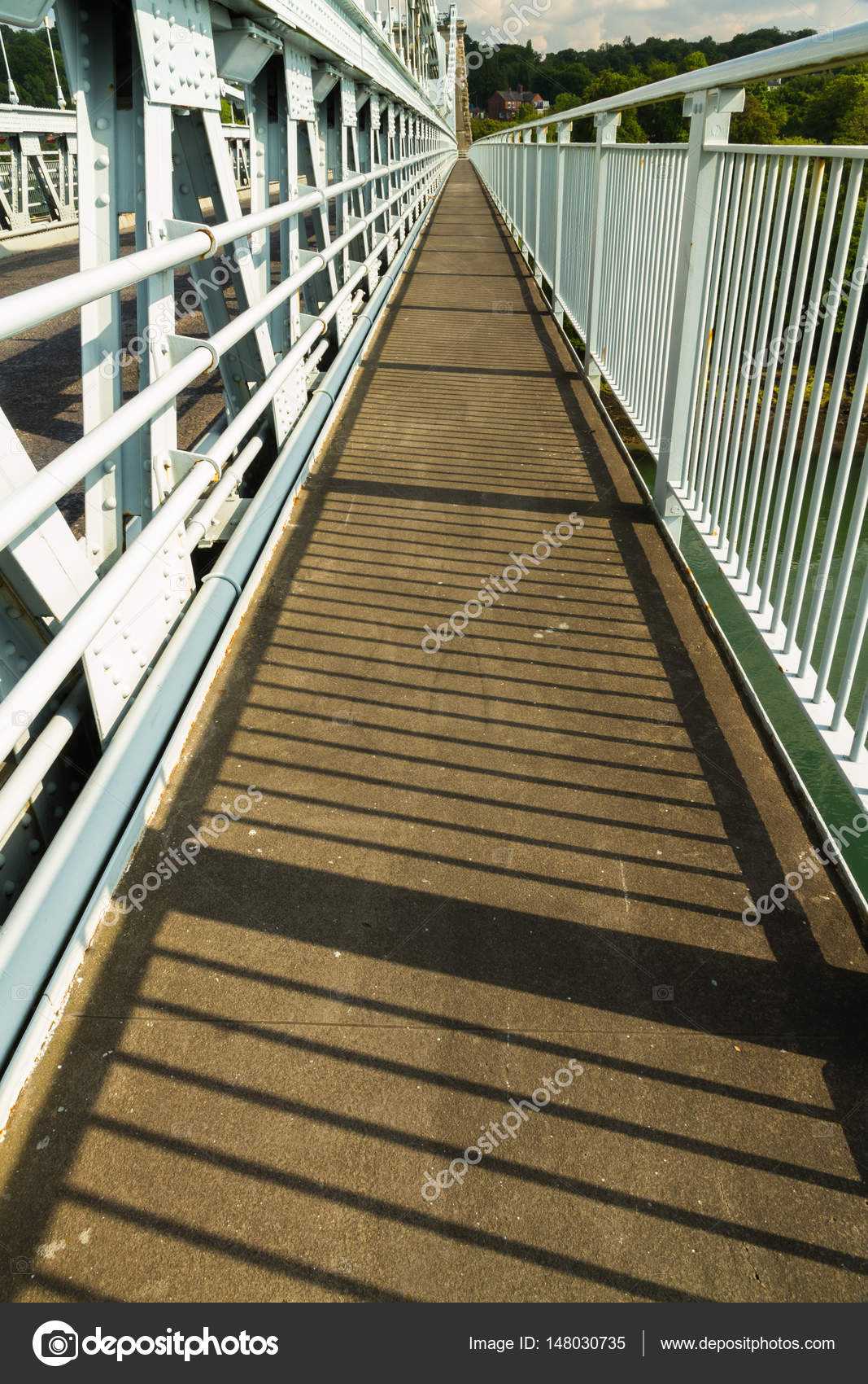 Footpath part of deck of the Menai Suspension Bridge over betwee ...
