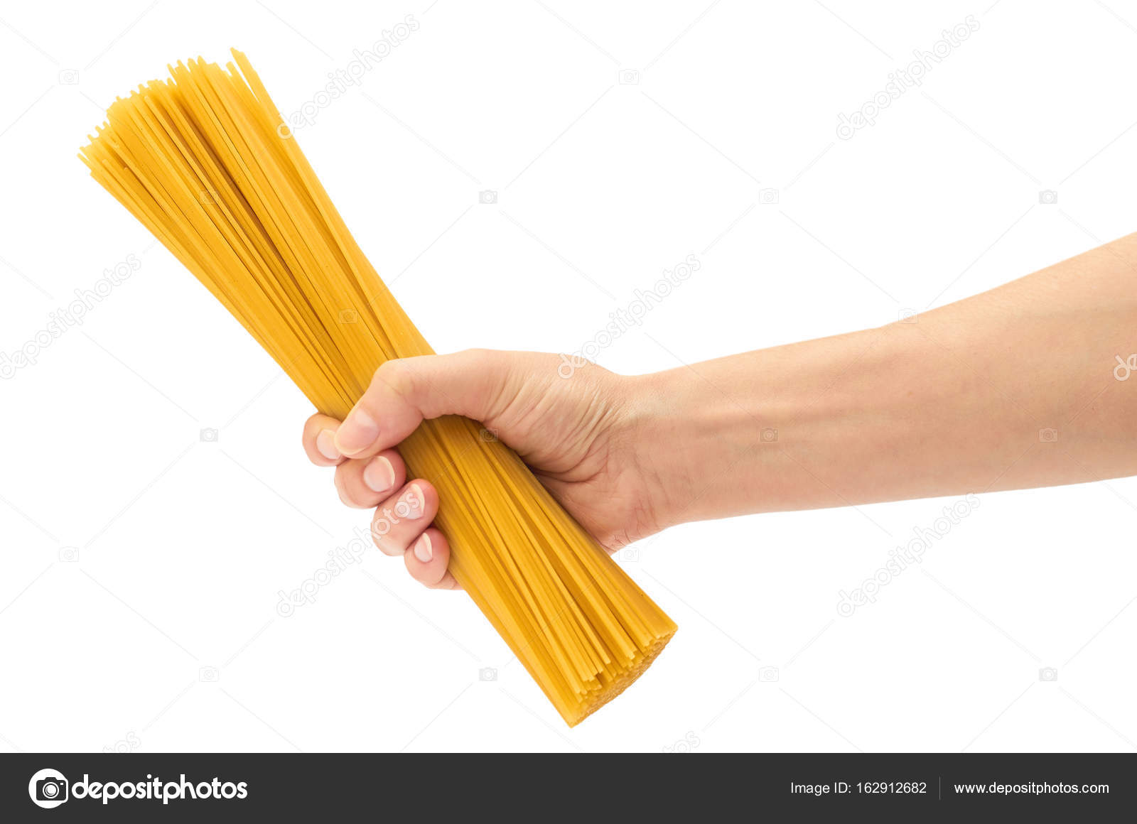 Female hand holding Raw spaghetti. isolated on white background — Stock ...