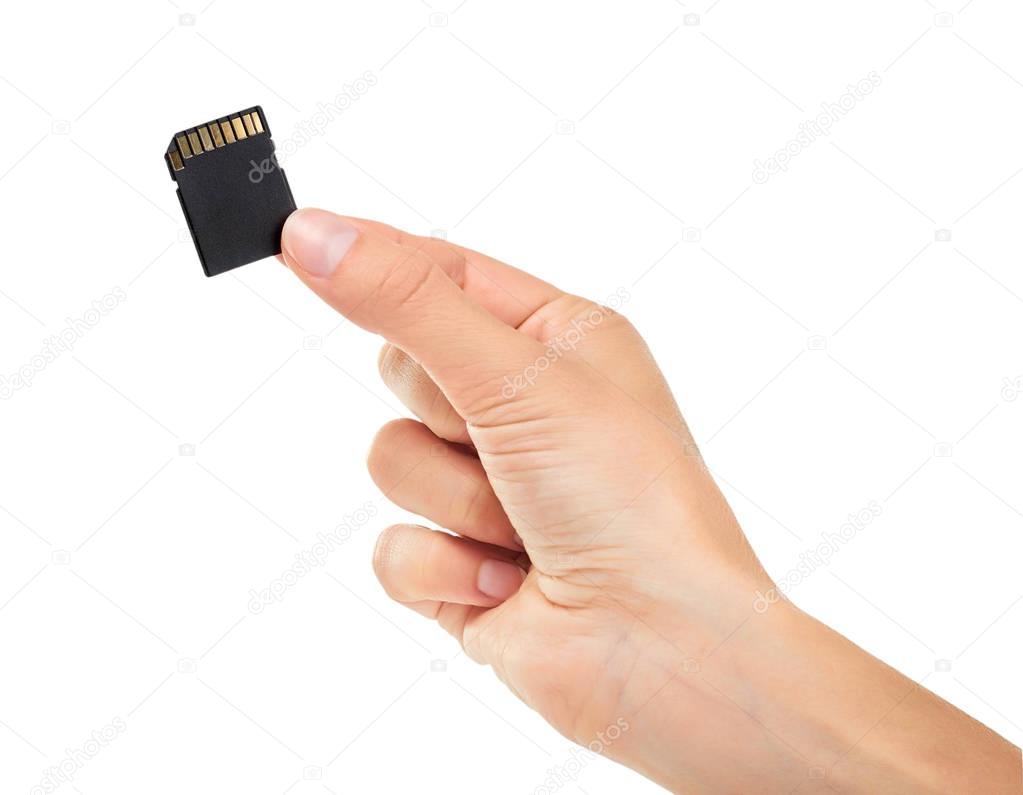 Female hand holding sd memory card. Isolated on white background ...