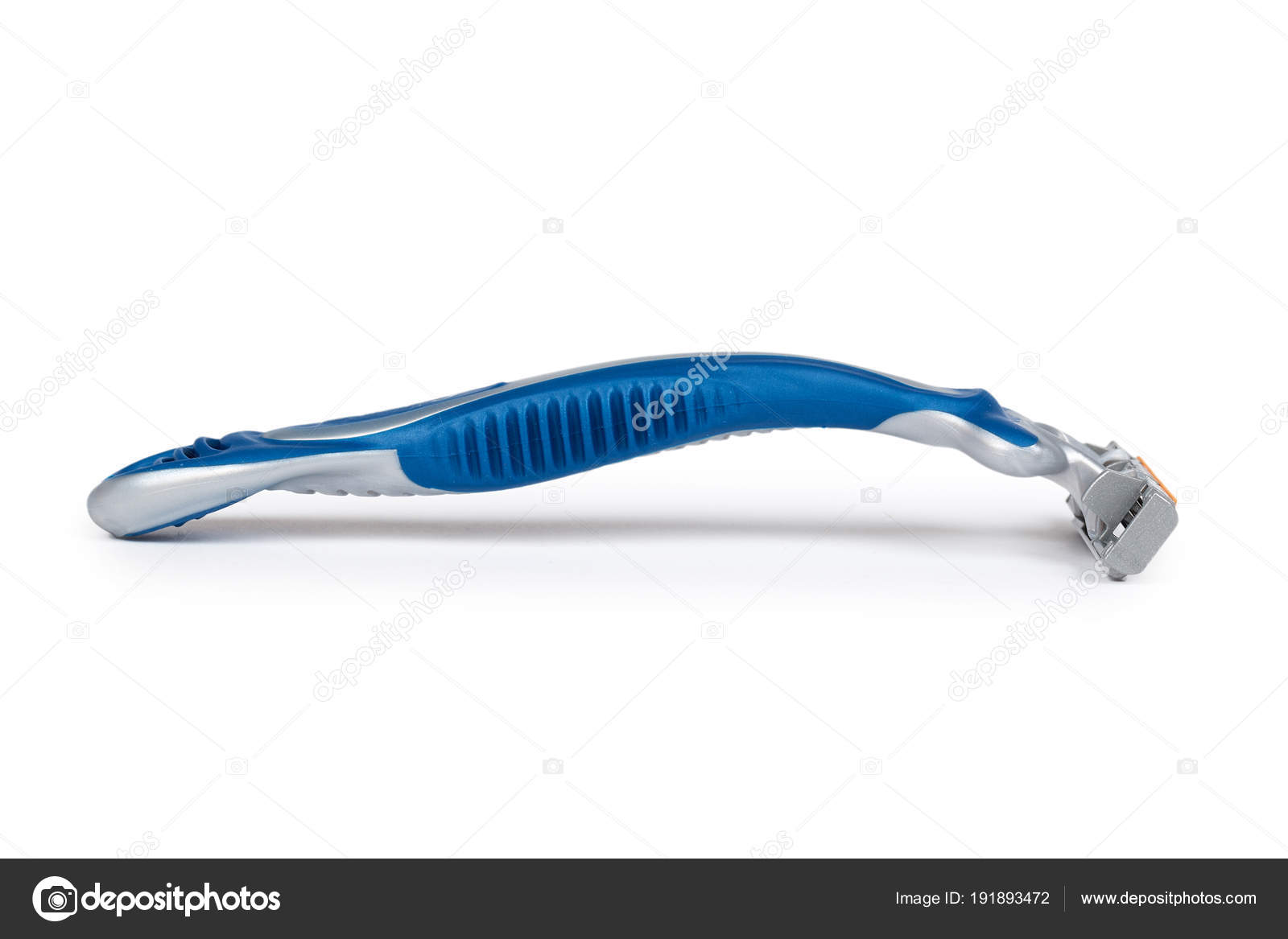 Disposable shaving razor blade in hand. Isolated on white background ...