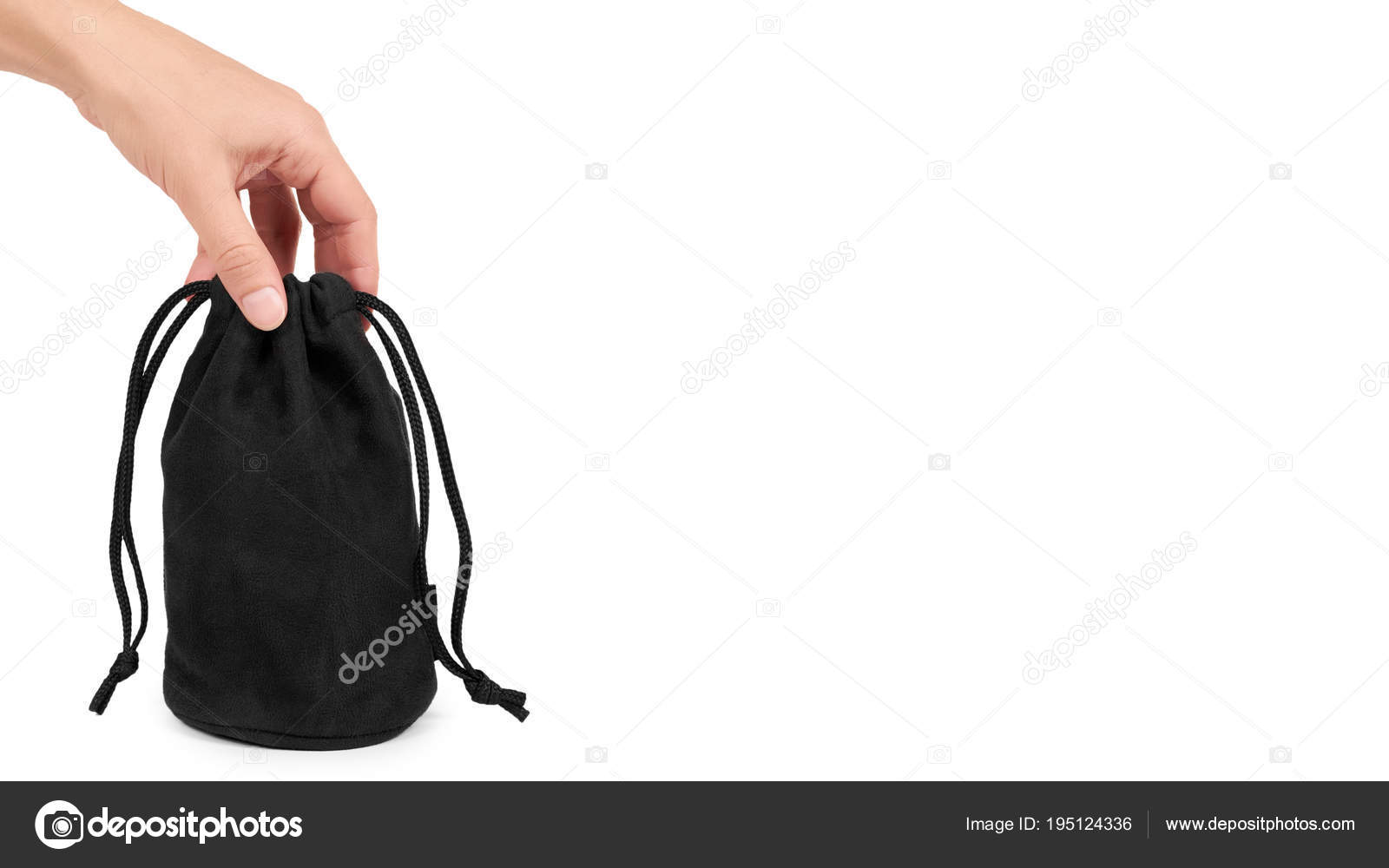 Black textile sack in hand isolated on white background. copy space ...
