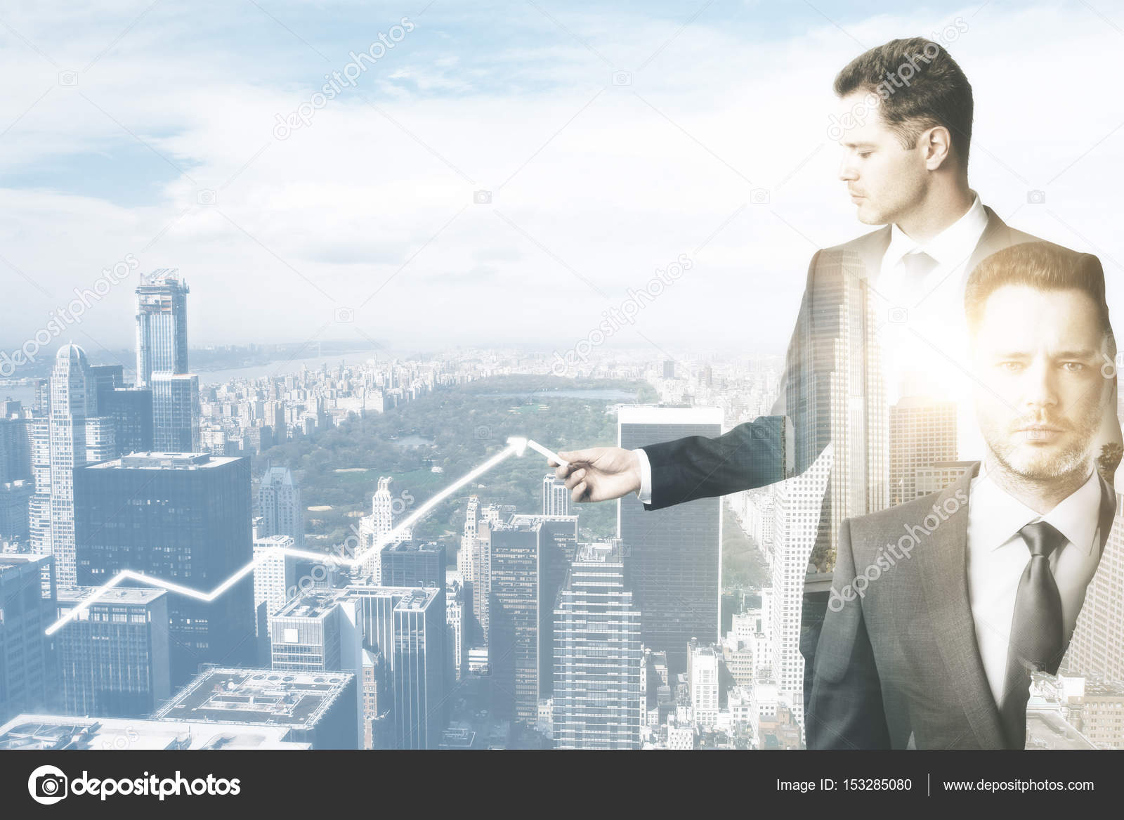 Two handsome businessmen drawing upward chart arrow on city background ...