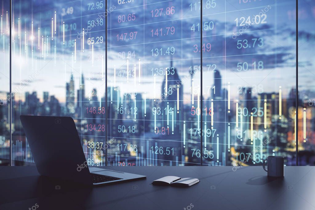 Ordenador port til en la mesa en la oficina con holograma gr fico de ca da de stock en la ...