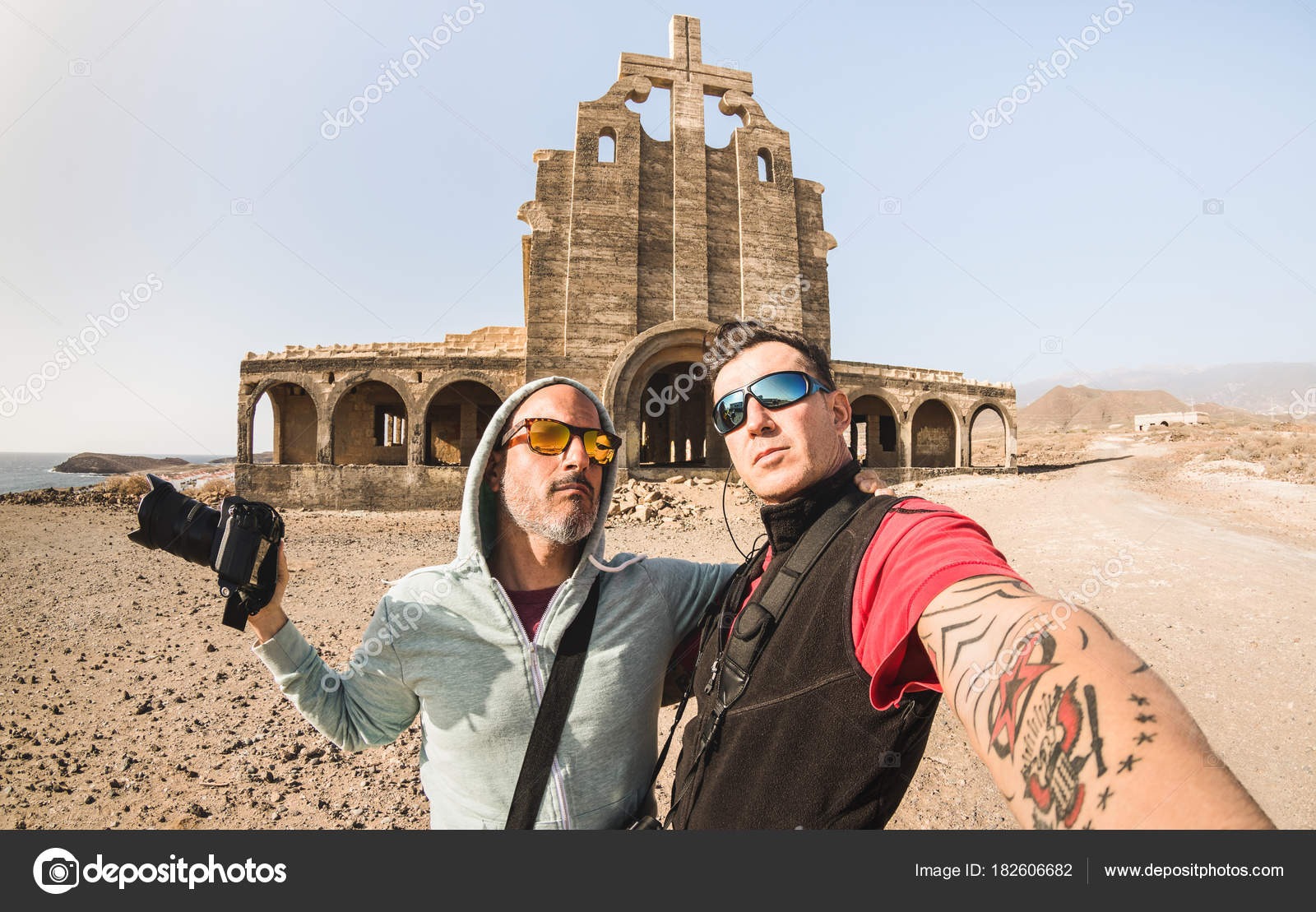 Adventurous best friends taking selfie at abandoned place in Tenerife ...