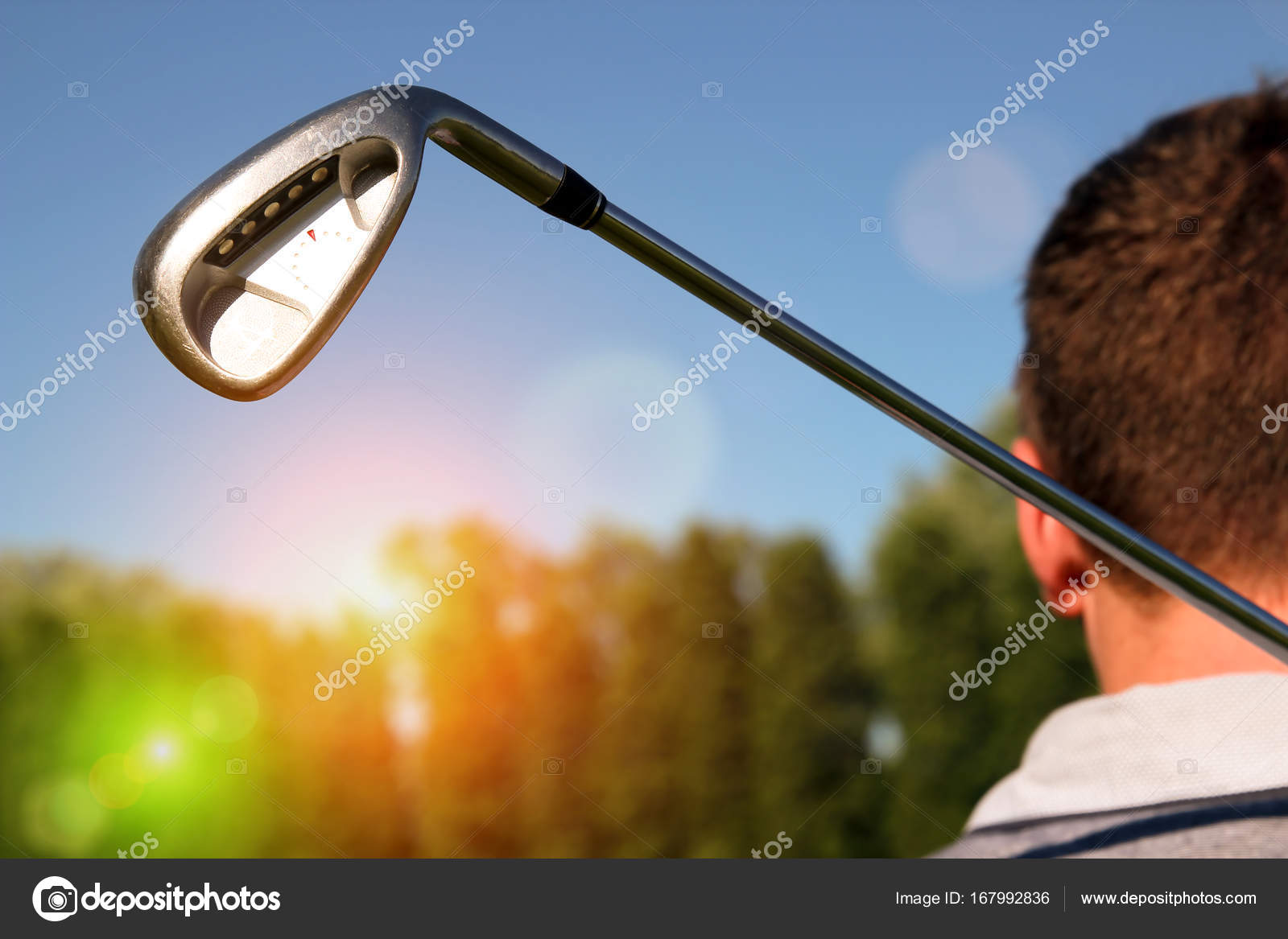 Golf player holding a golf club in golf course — Stock Photo © lianna_s ...