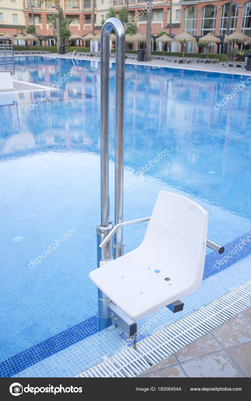 Swimming pool lift for disabled people access to the pool — Stock Photo ...