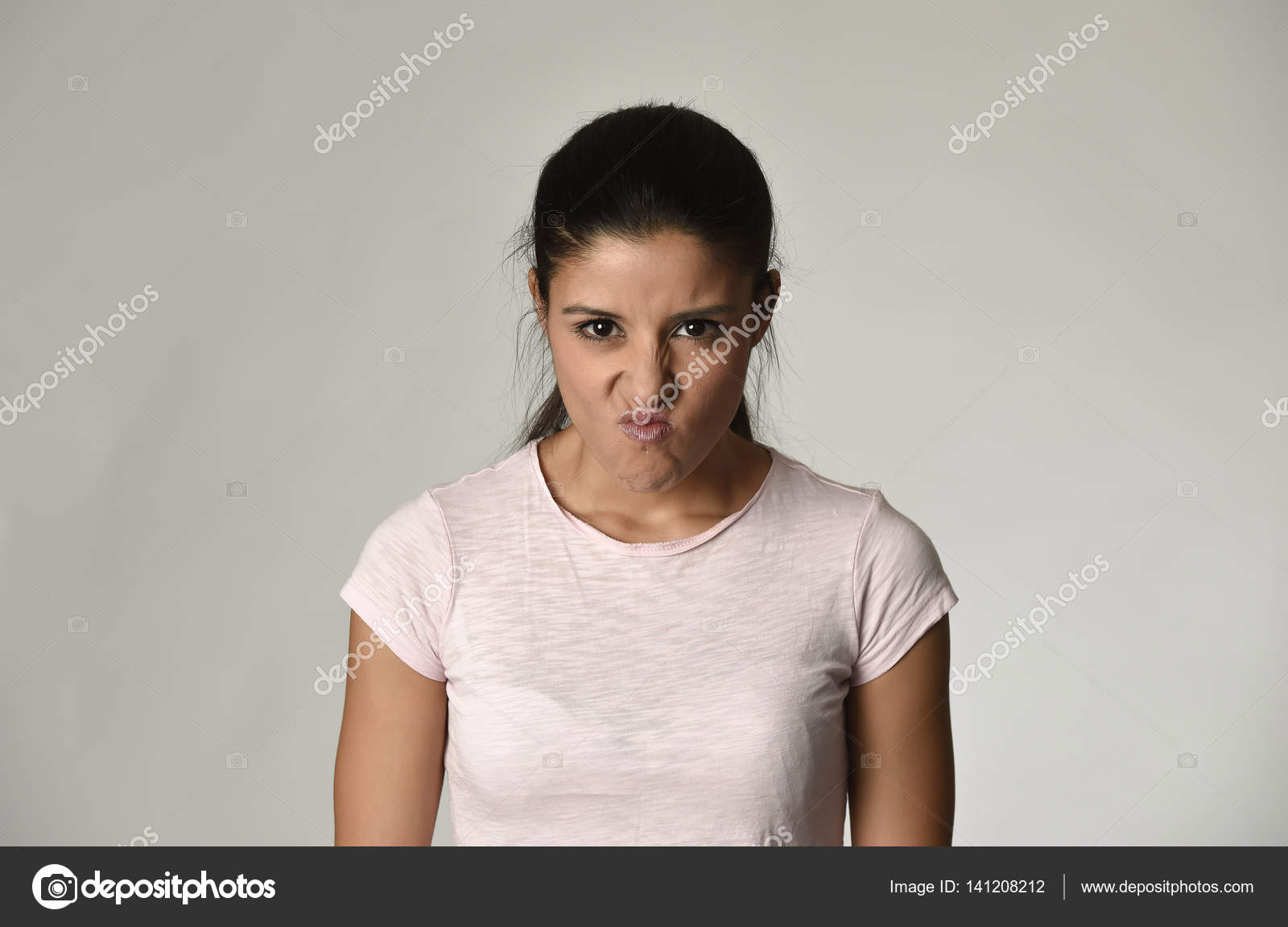 Latin angry and upset woman looking furious and crazy moody in intense ...