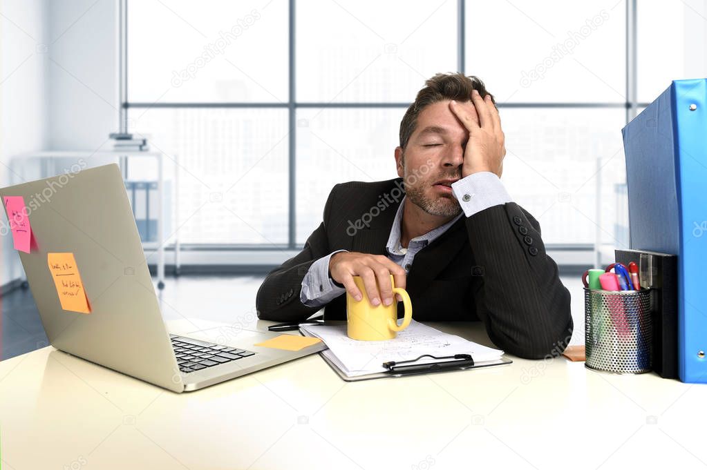 exhausted businessman suffering stress at office computer desk — Stock ...