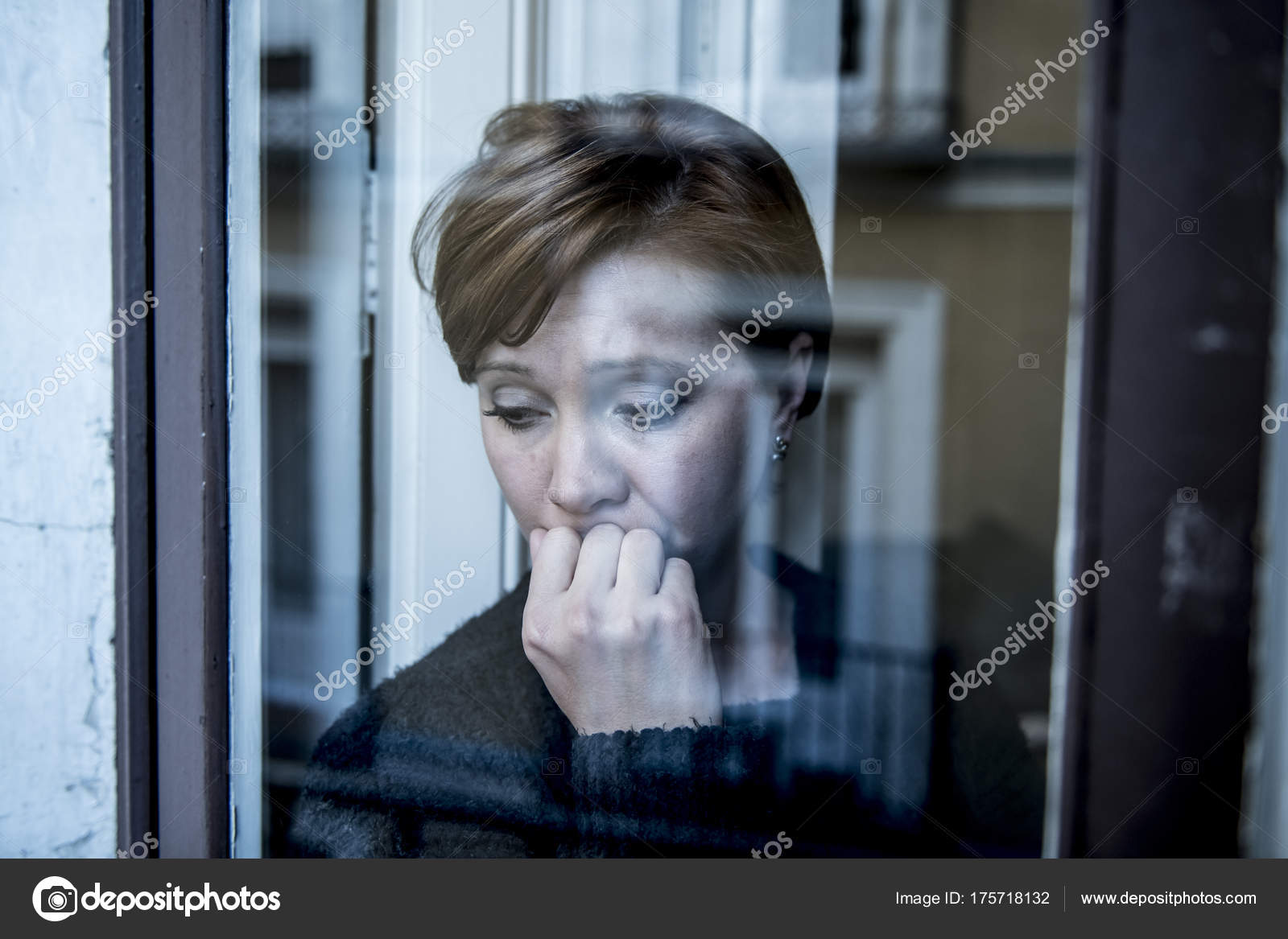 Dramatic close up portrait of young beautiful woman thinking and ...