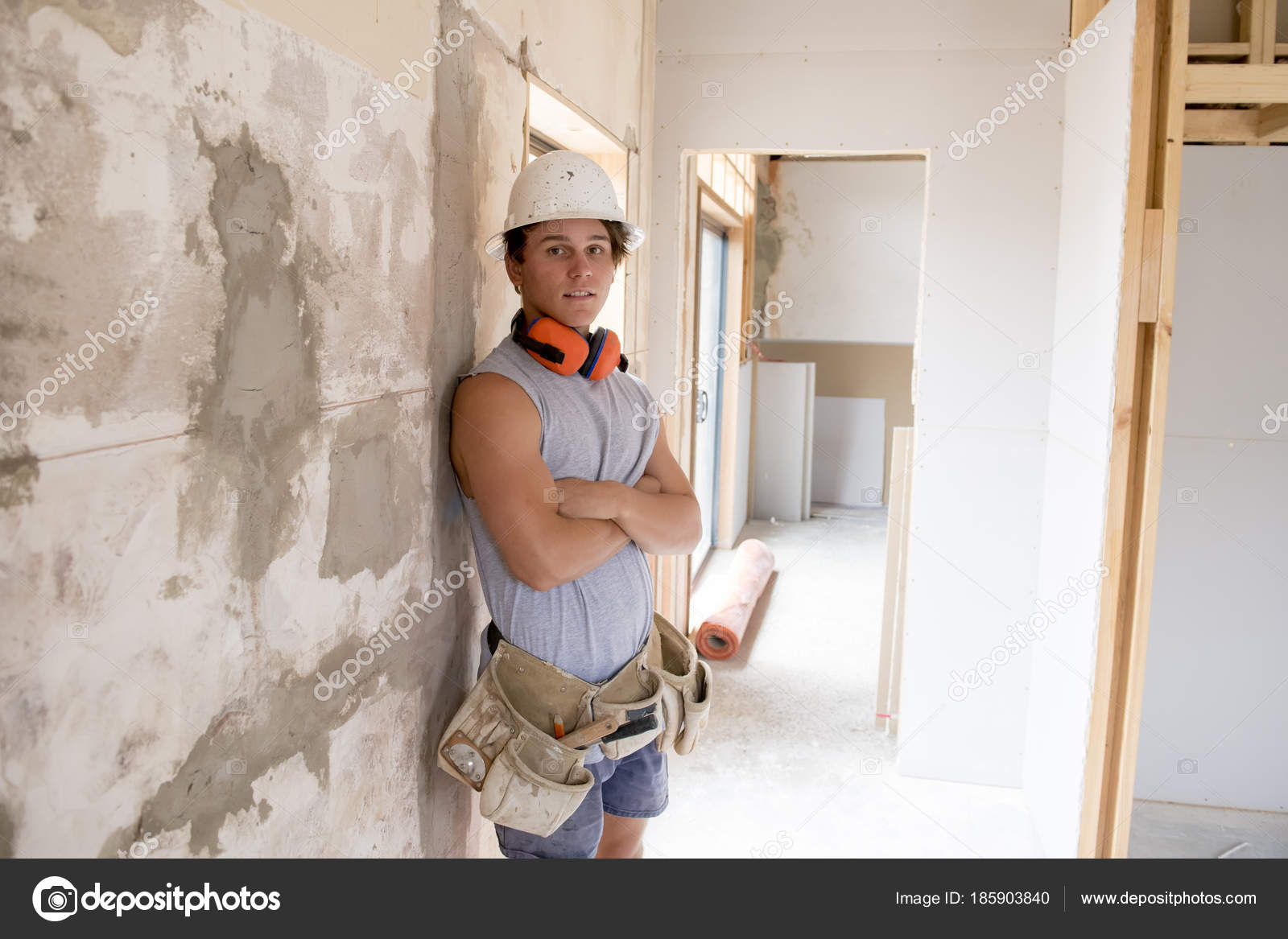 Young attractive and confident builder and constructor job trainee ...