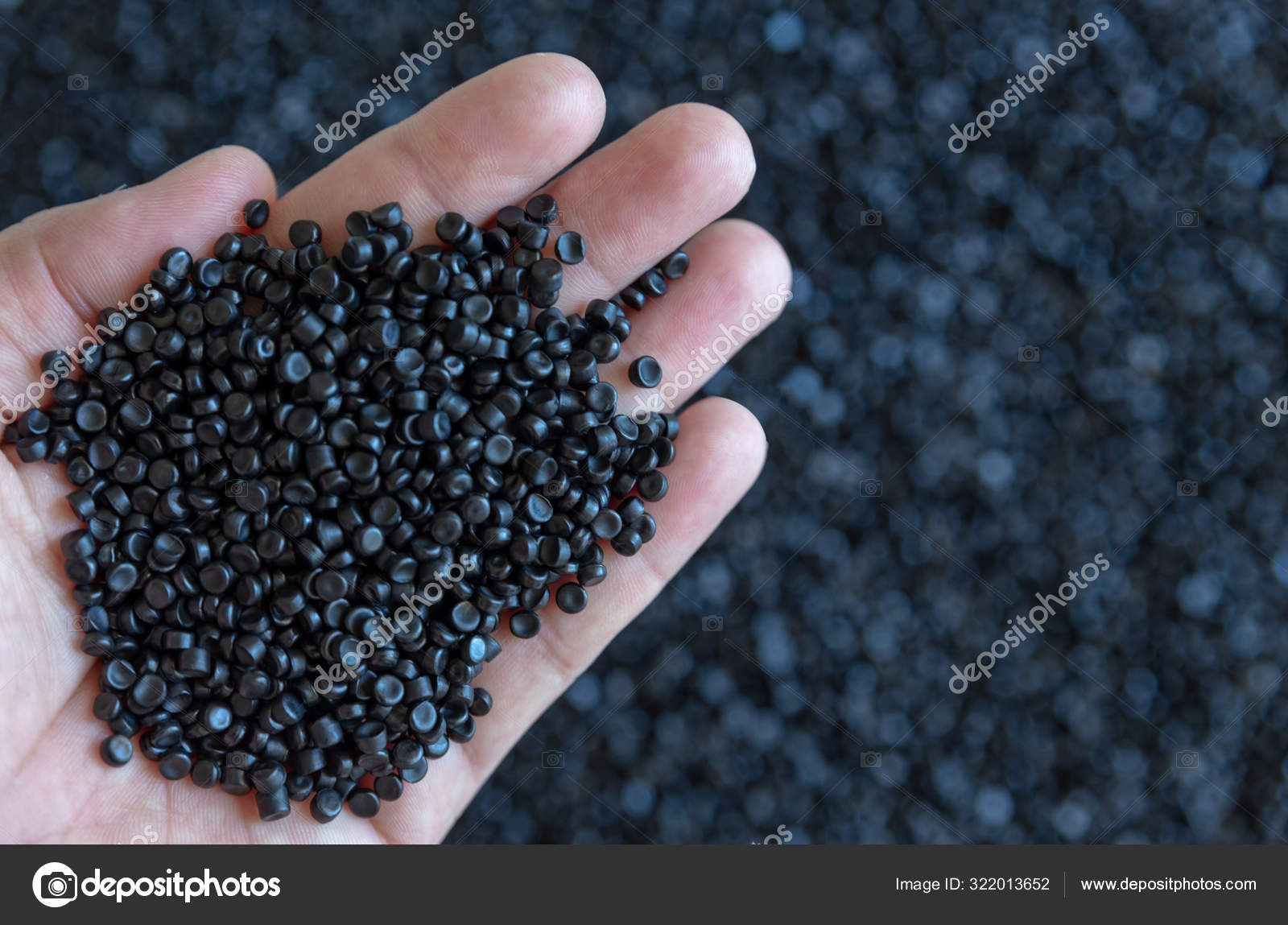 Close-up of plastic polymer granules. hand hold Polymer pellets ...