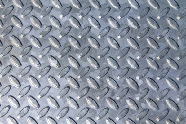 A metal background or texture with tread plate pattern Stock Photo by ...