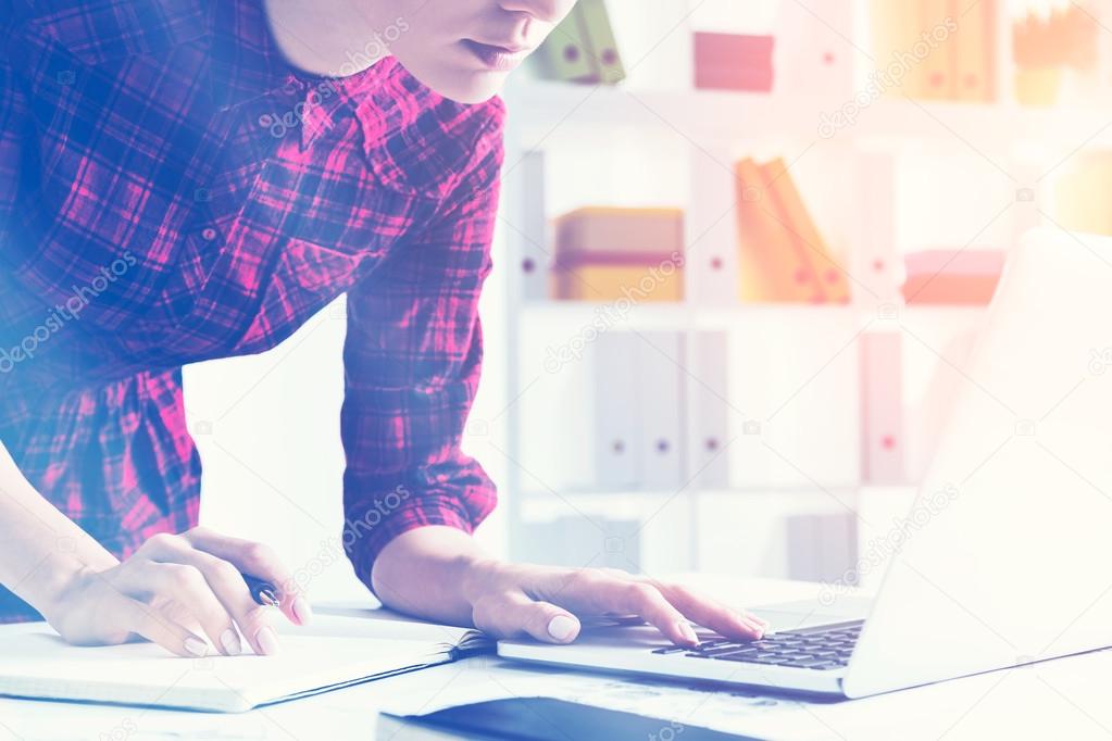 Pretty girl is checking facts in computer — Stock Photo ...