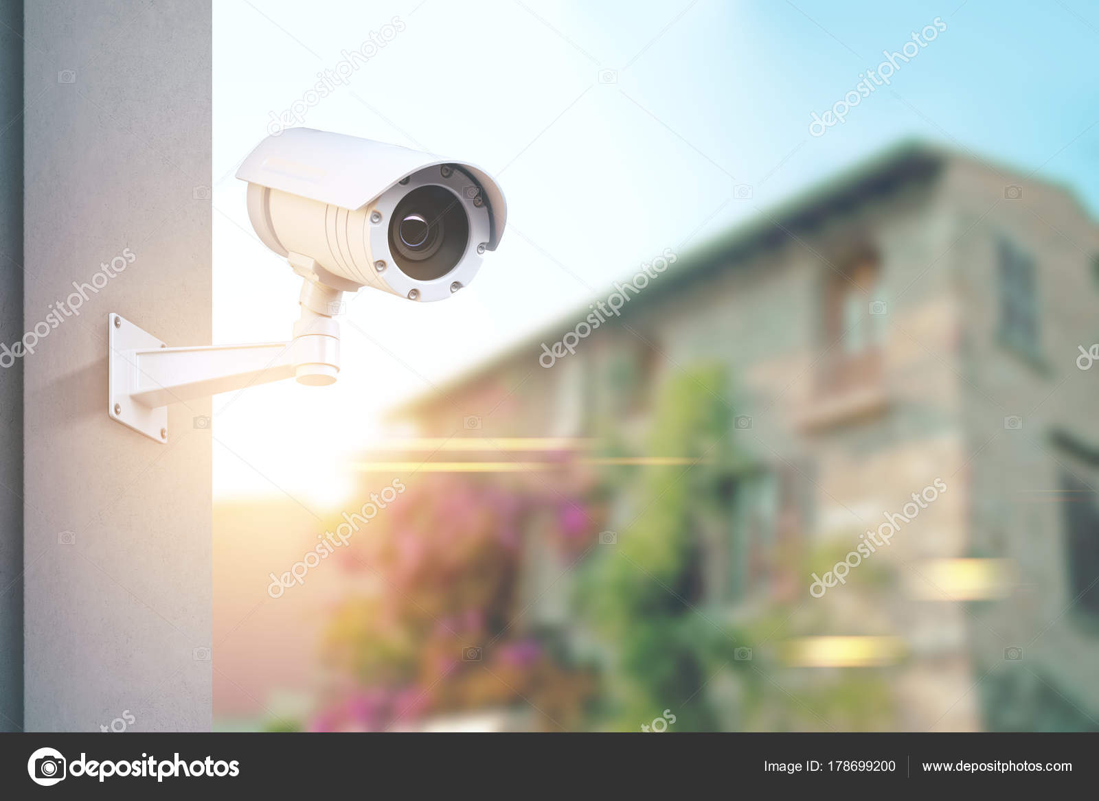 CCTV camera, blurred town Stock Photo by ©denisismagilov 178699200
