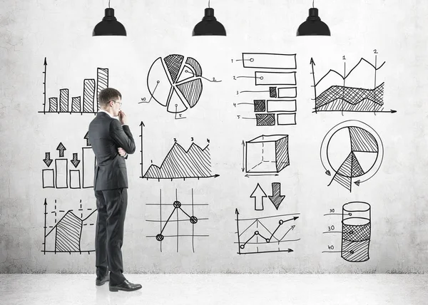 Confused businessman, rear view, infographics Stock Photo by ...