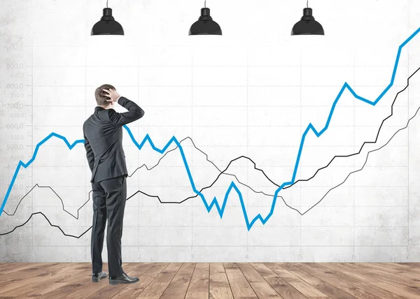 Confused businessman, rear view, infographics Stock Photo by ...