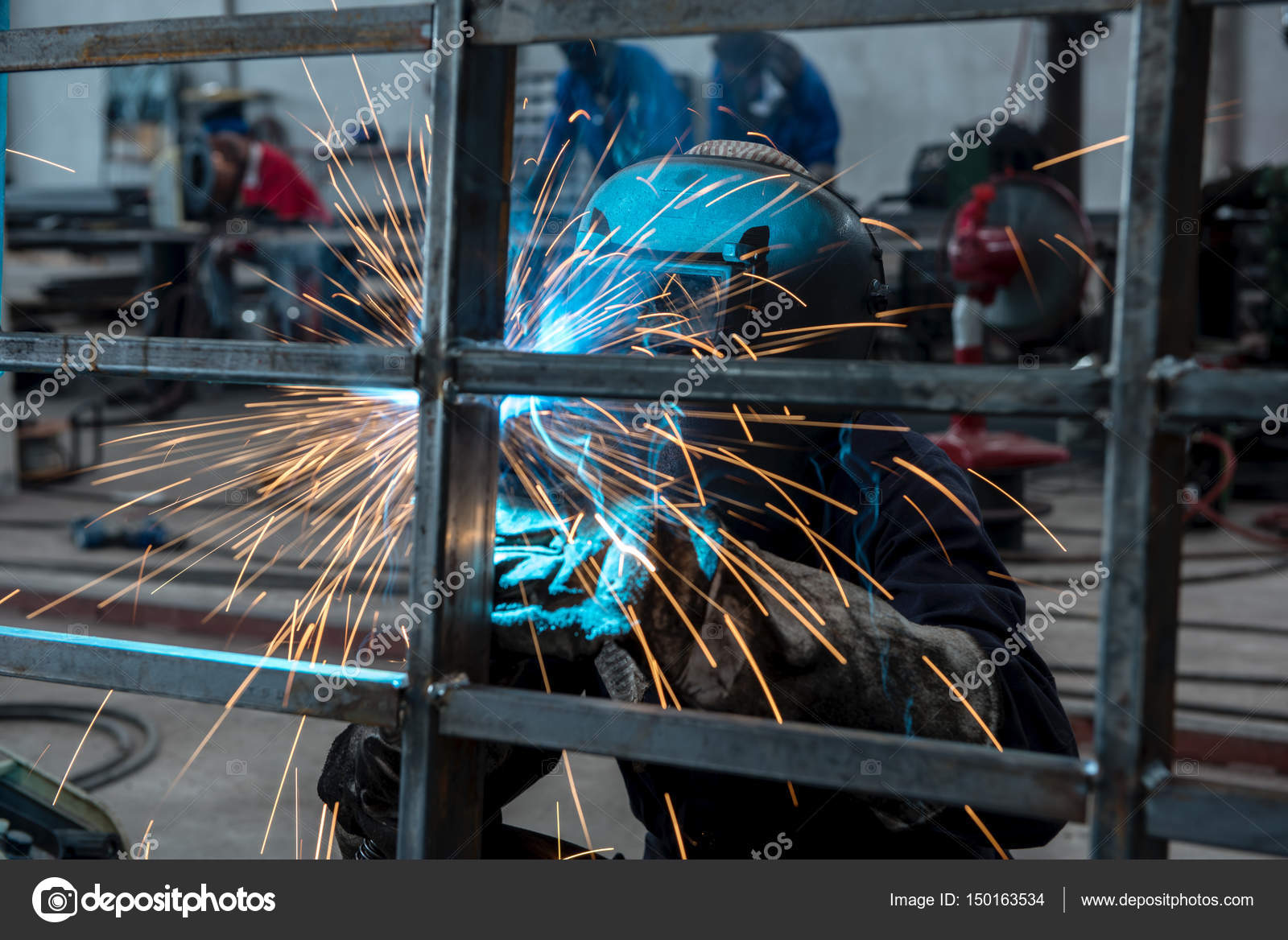 Welder welding steel structure in factory — Stock Photo © tipchai ...