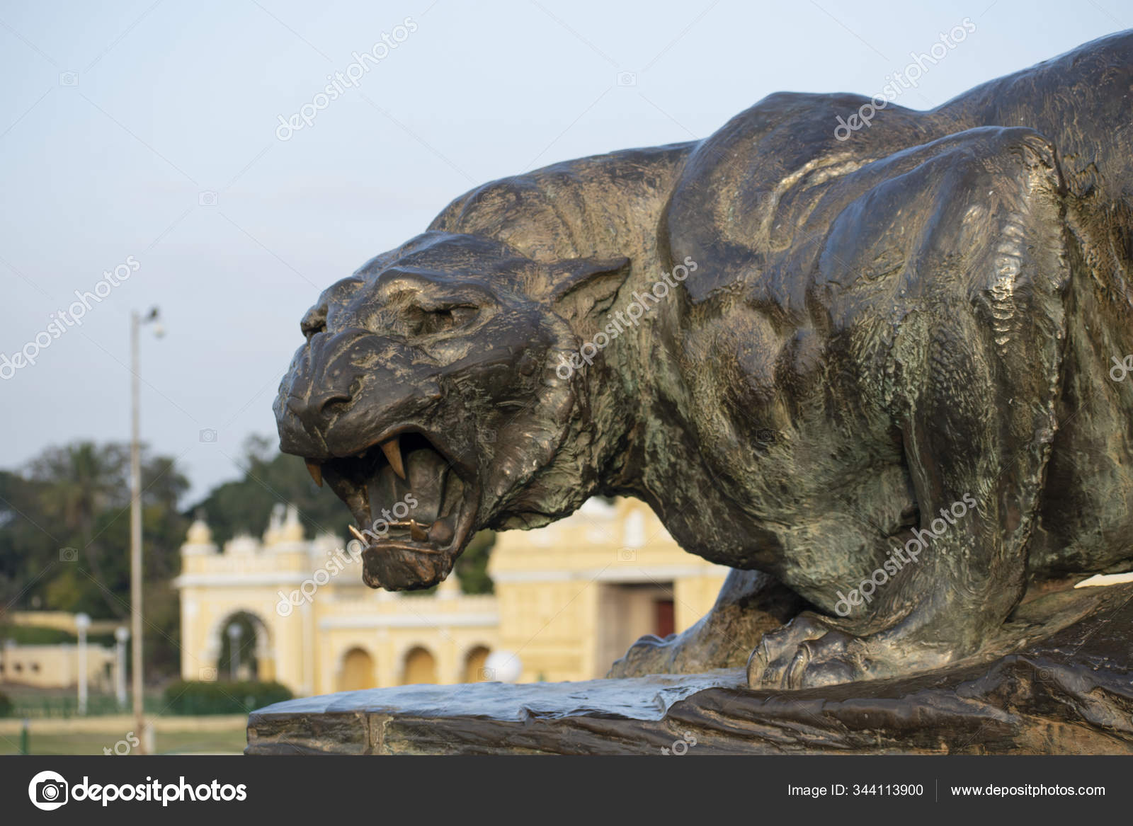 A statue of a ferocious tiger made of bronze Stock Photo by ...