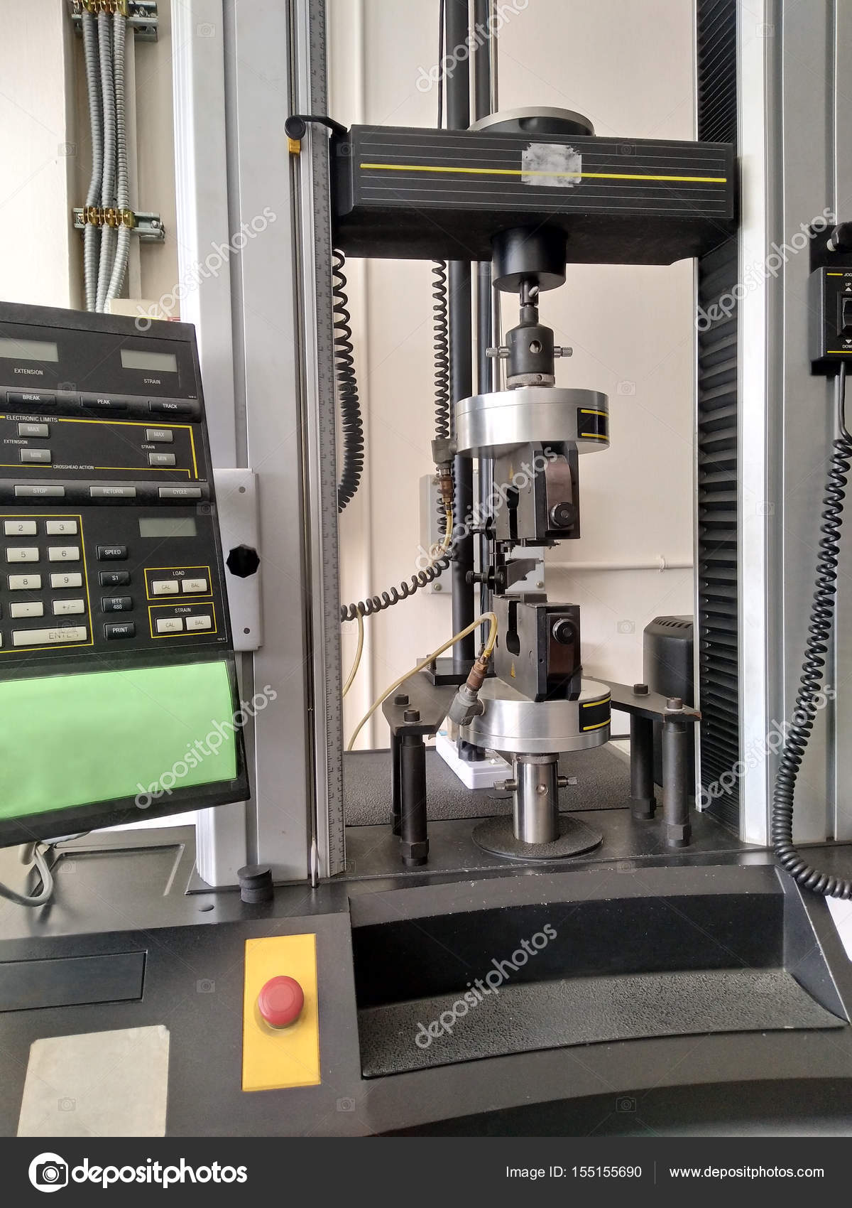 Tensile strength testing machine on laboratory Stock Photo by ©missisya ...