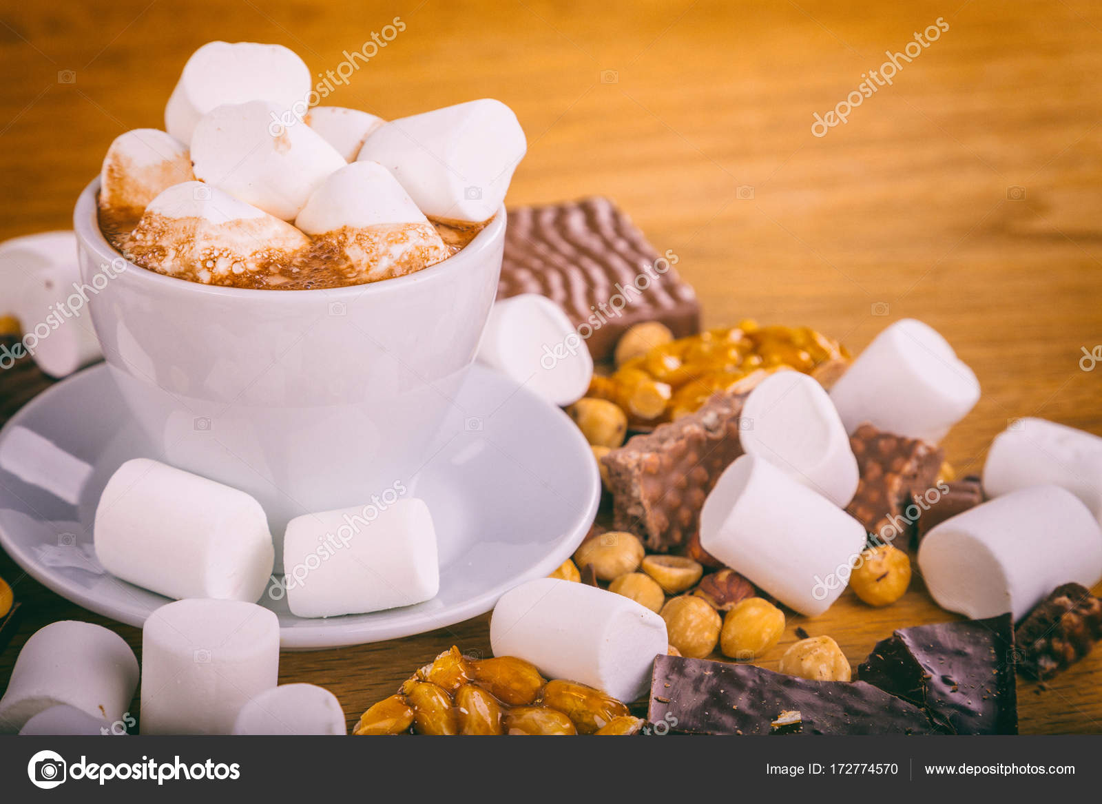 A cup of coffee with marshmallows. Marshmallows, chocolate and other ...