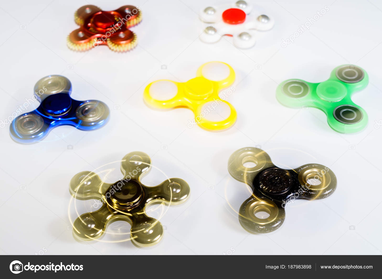 Different Spinners White Background Stock Photo by ©aallm 187983898