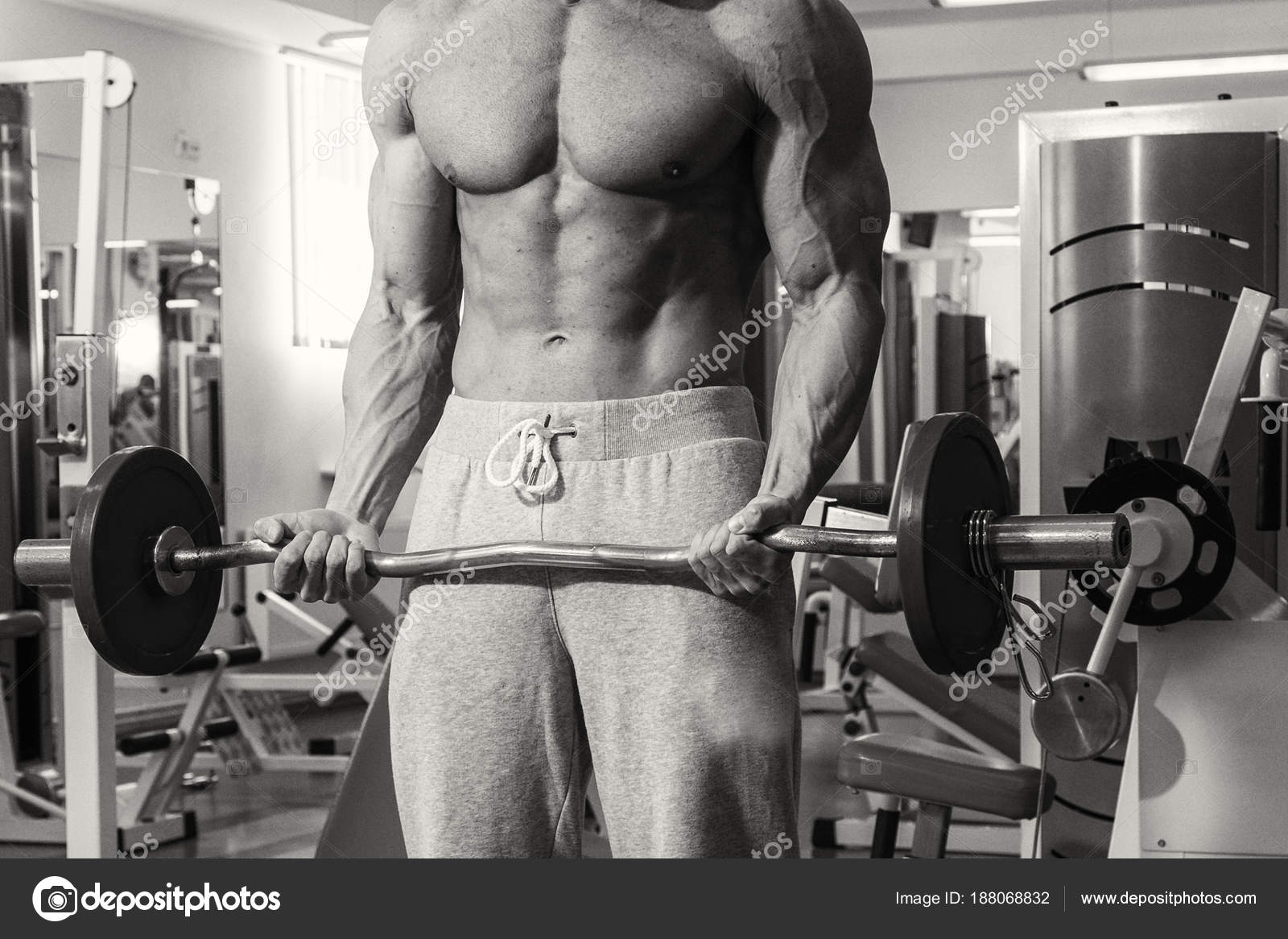 Muscular Embossed Bodybuilder Beautiful Photo — Stock Photo © aallm ...