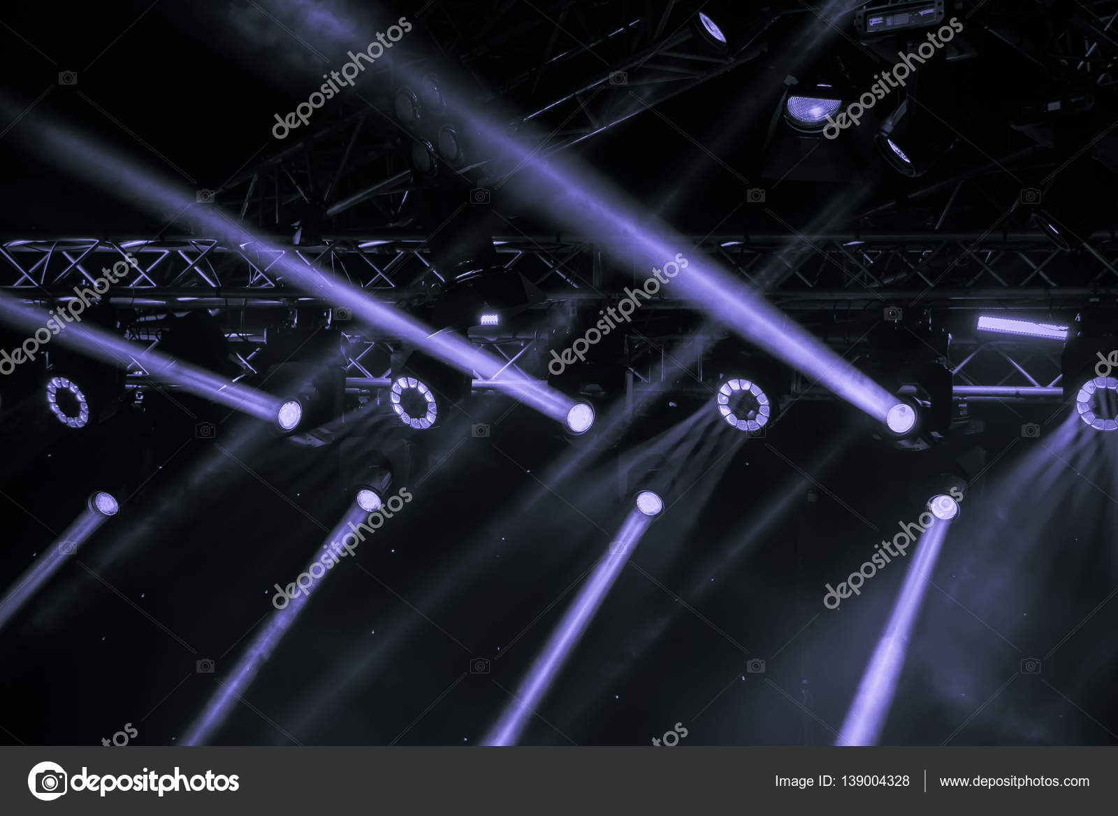 Blue luminous rays from concert — Stock Photo © Tzido #139004328