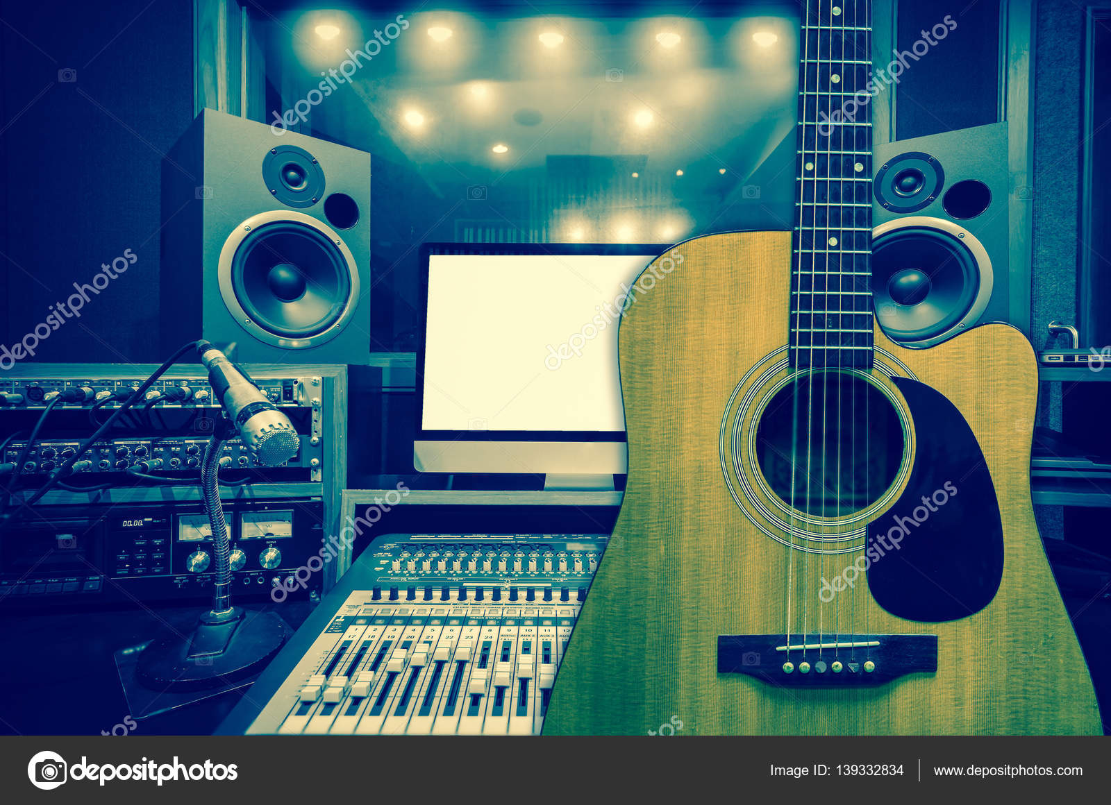 Guitar on music studio background Stock Photo by ©Tzido 139332834