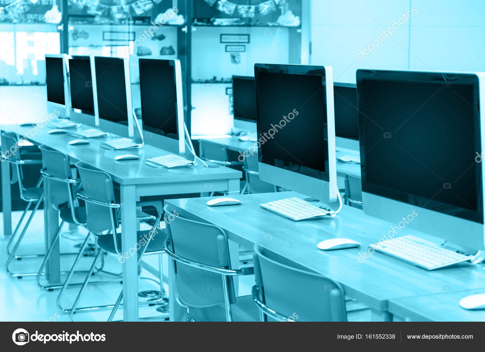 Rows of computer monitors Stock Photo by ©Tzido 161552338