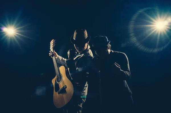 Musician Duo band playing Stock Photo by ©Tzido 155275022