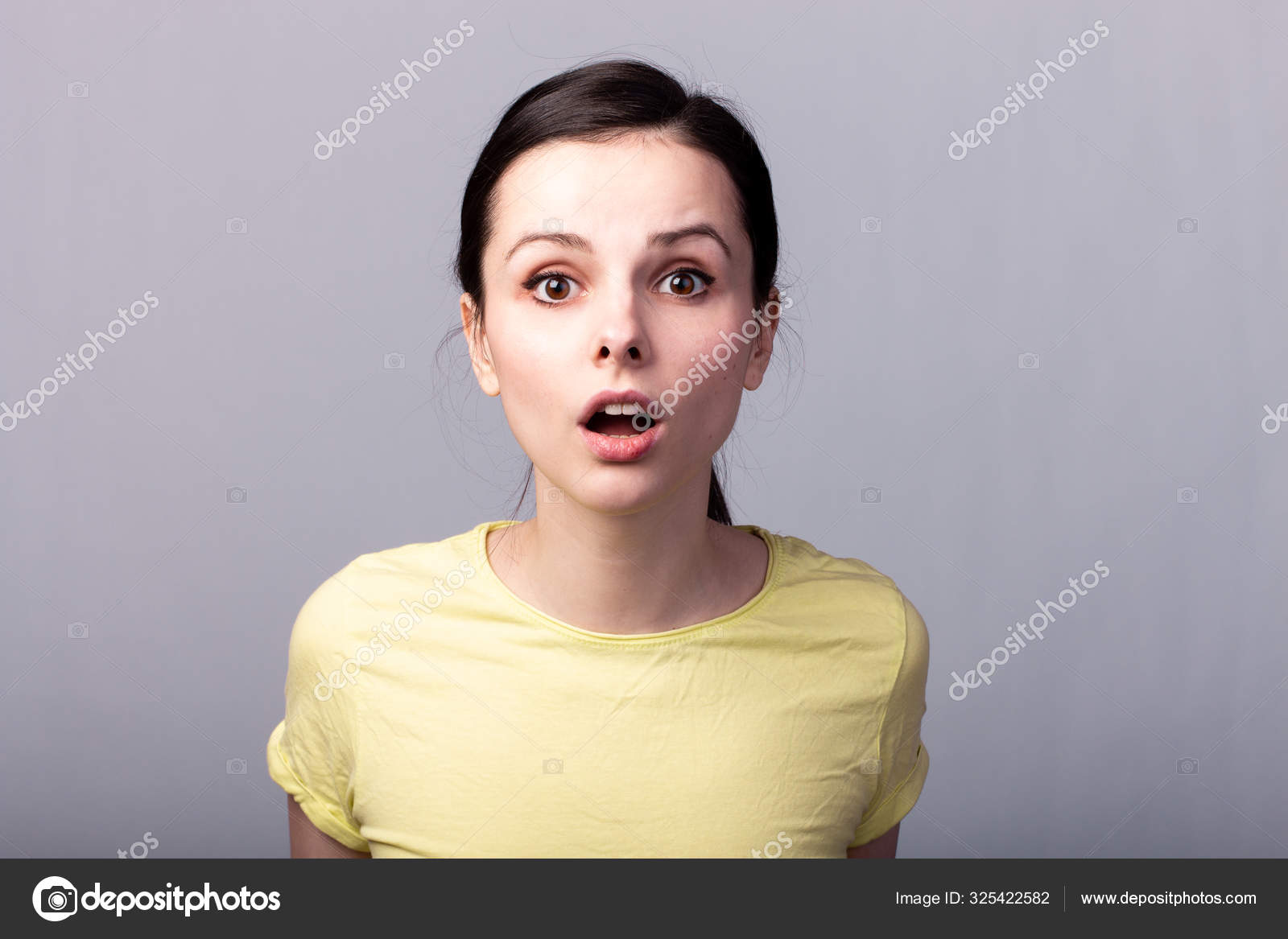Young Emotional Girl Yellow Shirt Gray Background — Stock Photo ...