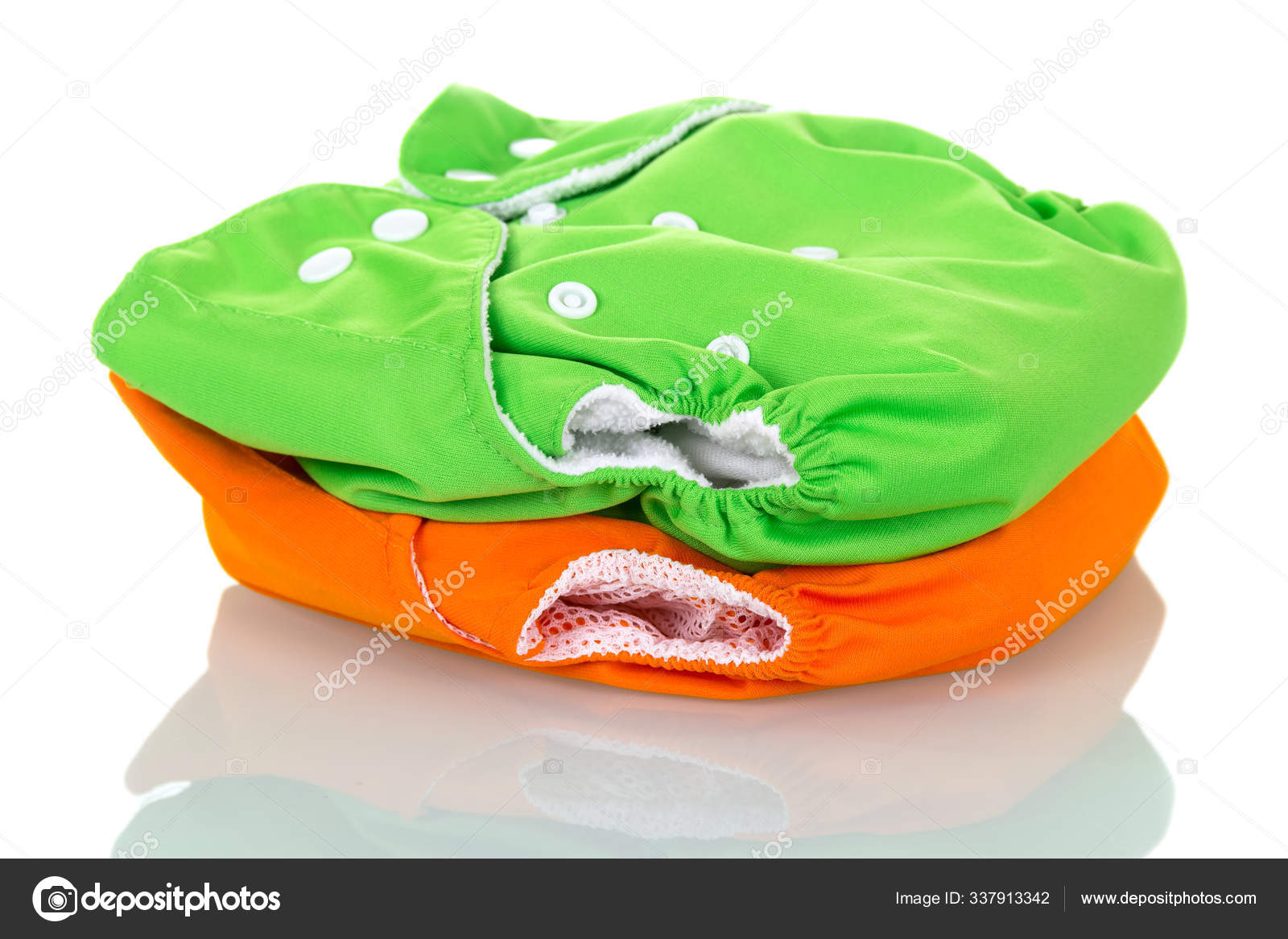 Green and orange modern eco friendly diapers isolated on white. Stock ...