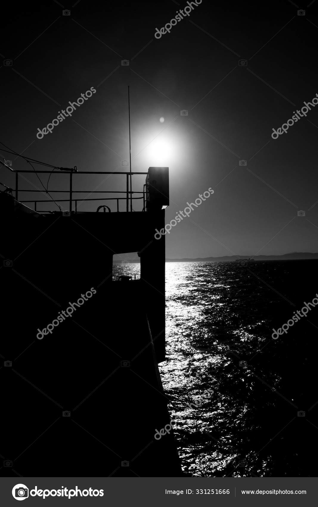 Greyscale Sea Ship Sunlight Daytime — Stock Photo © Wirestock #331251666