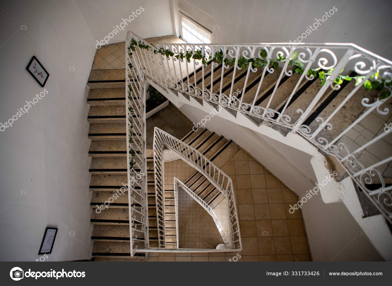 High angle view of a white staircase with windows under sunlight ...