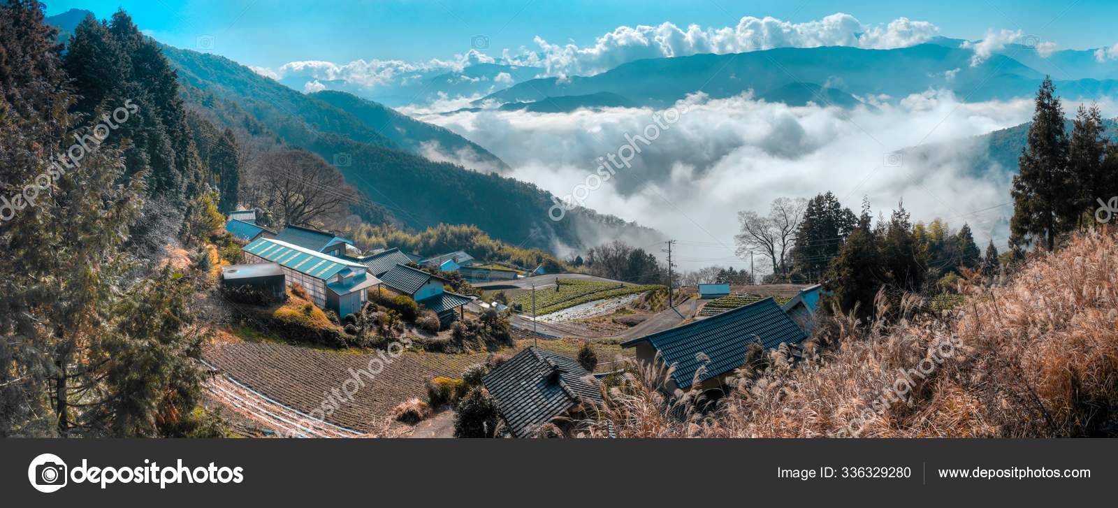 Wide Shot Buildings Mountain Clouds Blue Sky — Stock Photo © Wirestock ...