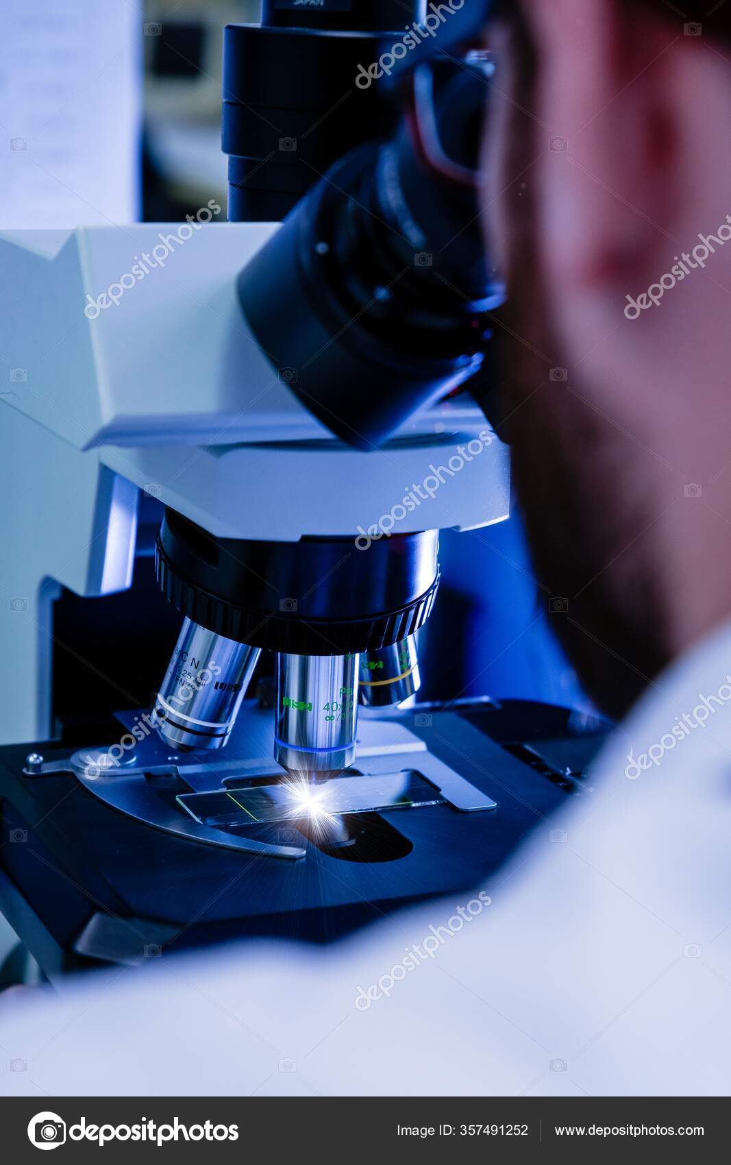 Vertical Closeup Shot Laboratory Worker Working Modern Microscope While ...