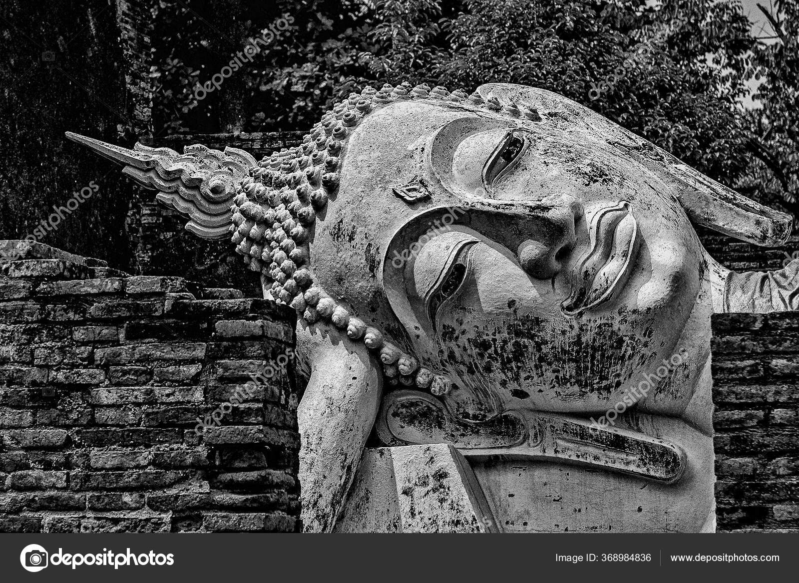 Grayscale Shot Old Buddha Statue Stock Photo by ©Wirestock 368984836